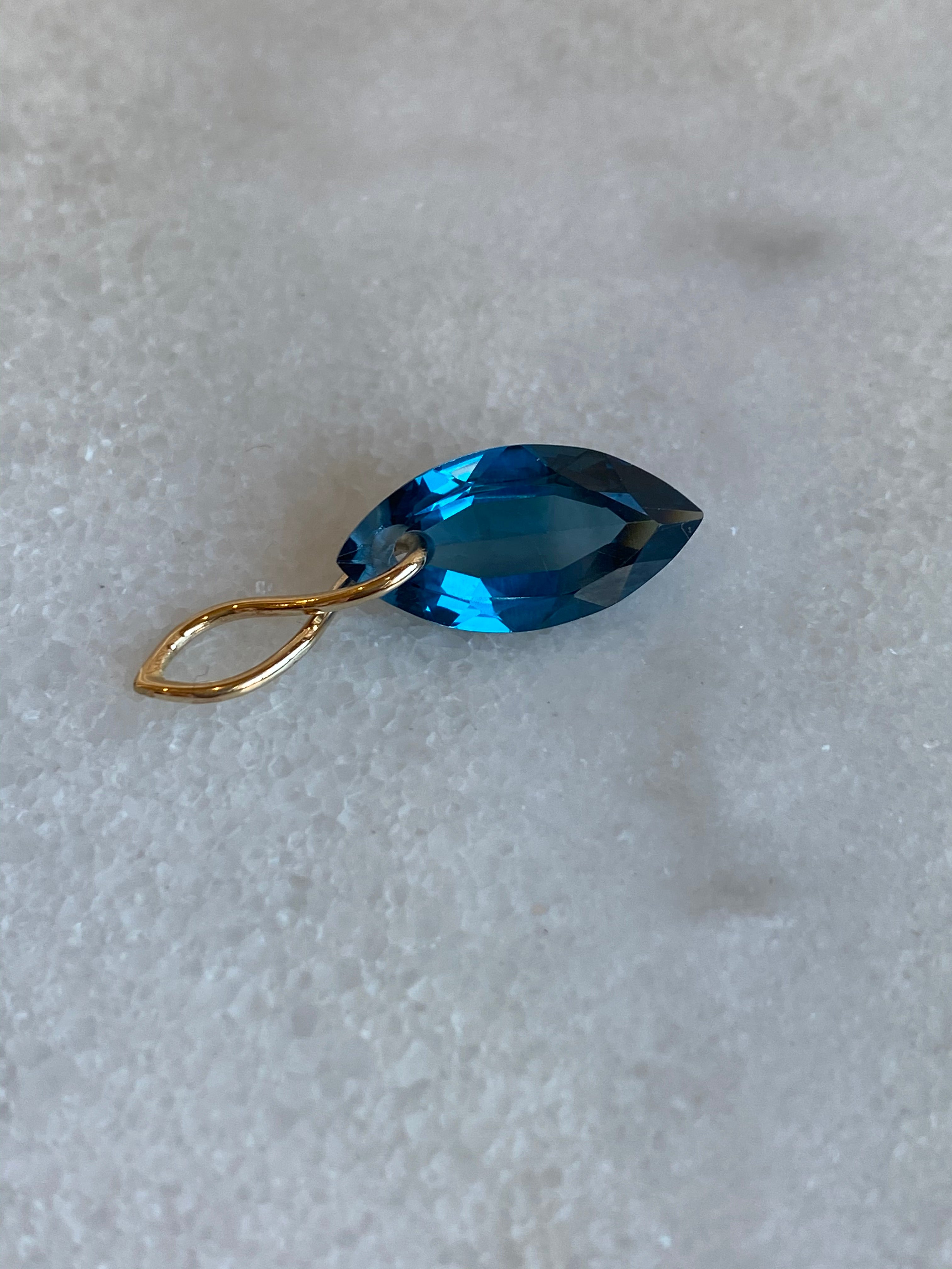 Deep Blue Topaz Small Marquise Cut Blue Topaz Gem Charm set on a 14k y ...